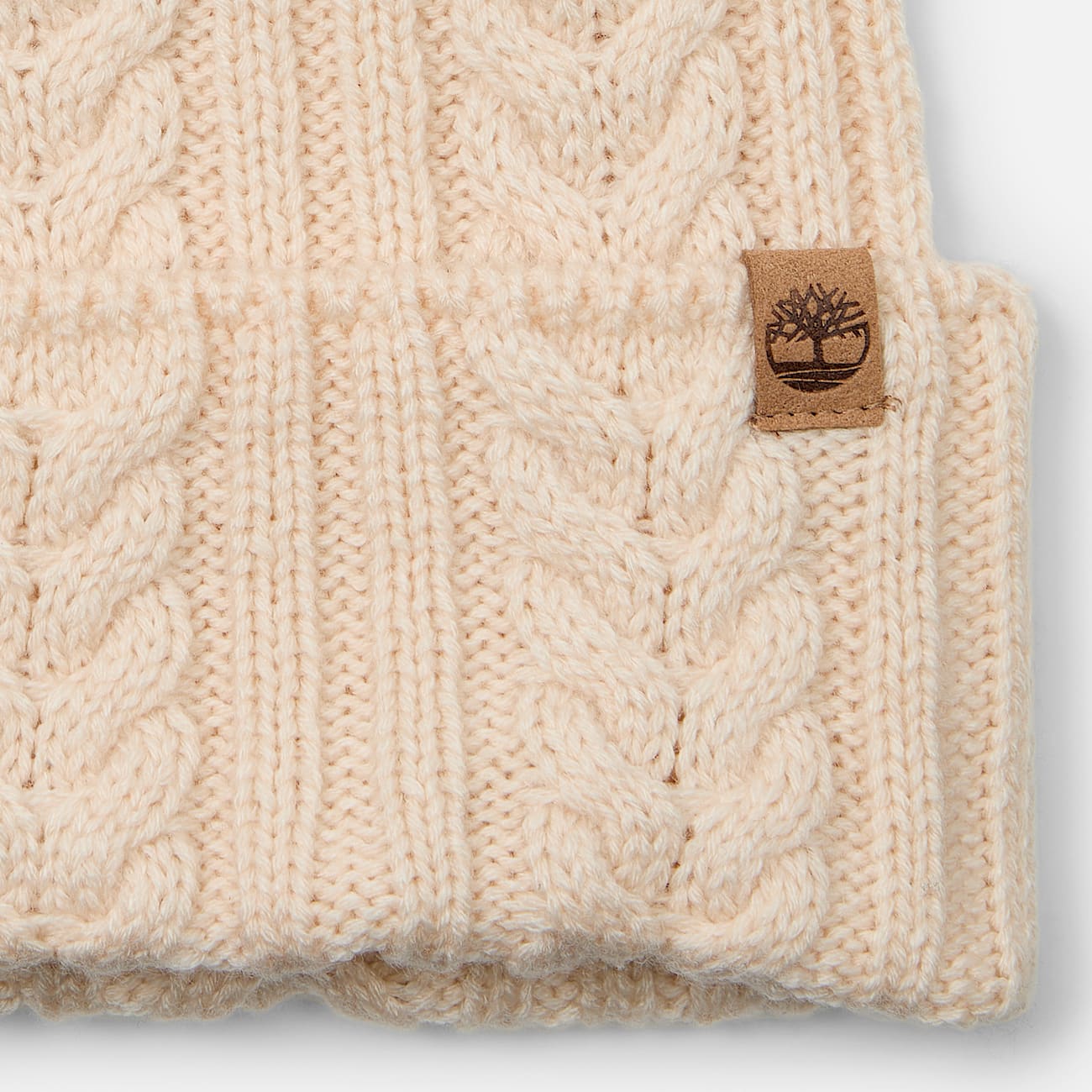 Bonnet torsadé en beige